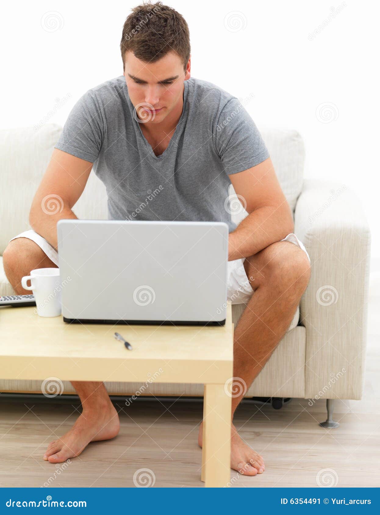 Man Sitting on Couch and Using Laptop Stock Image - Image of human ...