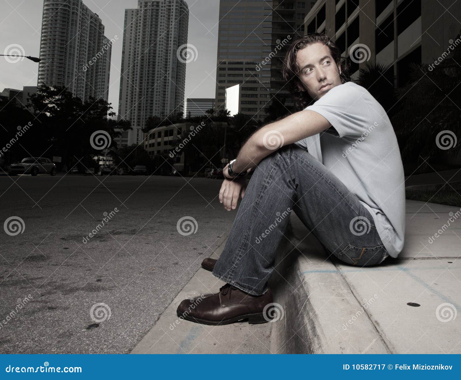 Man sitting on a curb stock image. Image of young, thirties - 10582717