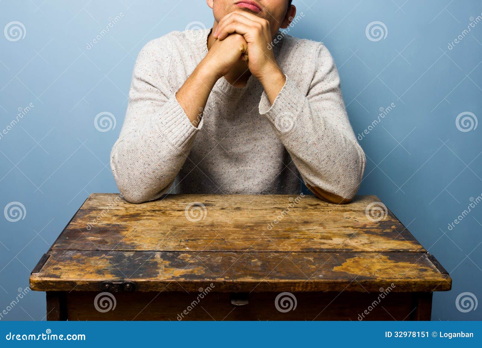 Man Sitting at Desk Deep in Thought Stock Image - Image of multi, chic ...