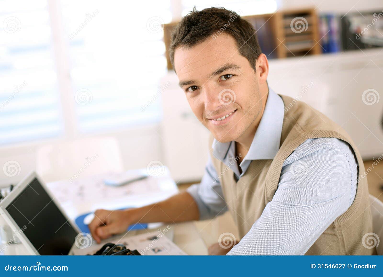 Man Sitting at Desk and Using a Laptop at Work Stock Image - Image of ...