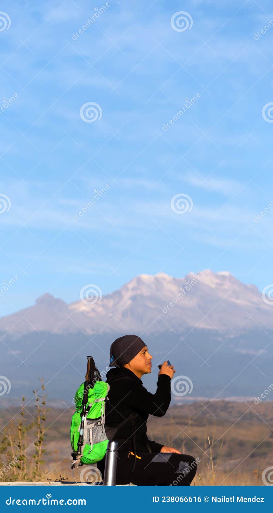 A Man Sitting Drinking Coffee Overlooking the Iztaccihuatl Volcano ... A Man Sitting Drinking Coffee Overlooking the Iztaccihuatl Volcano ...