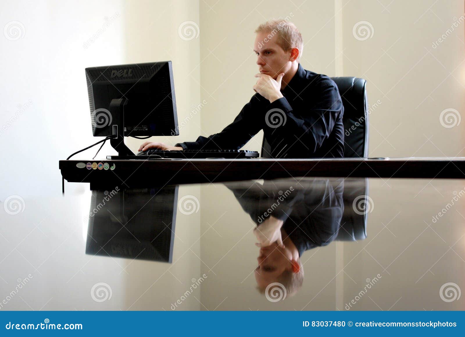 Man Sitting Facing Pc Inside Room Picture. Image: 83037480