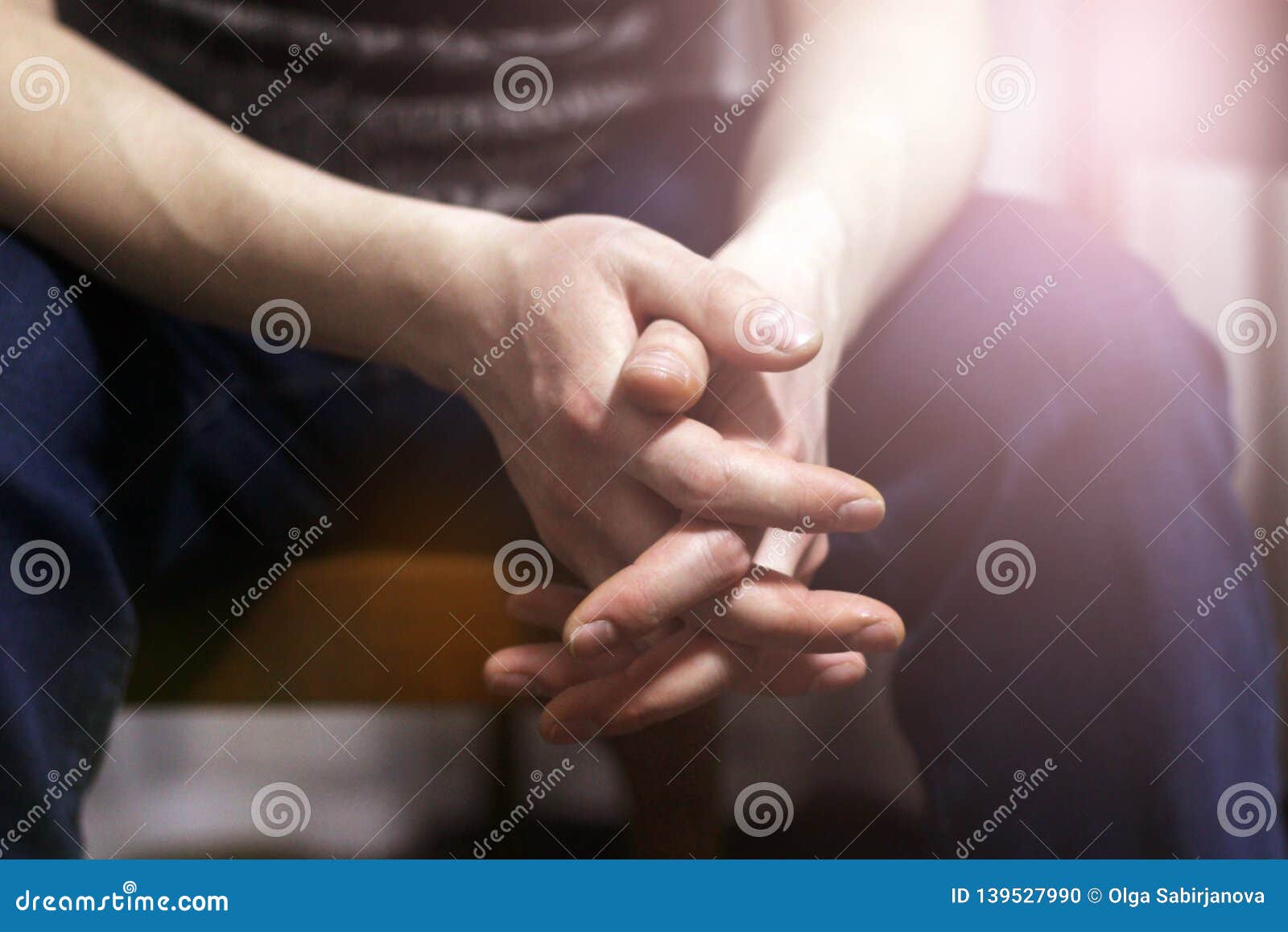 Man Sitting with Folded Hands Stock Photo - Image of generation, folded ...