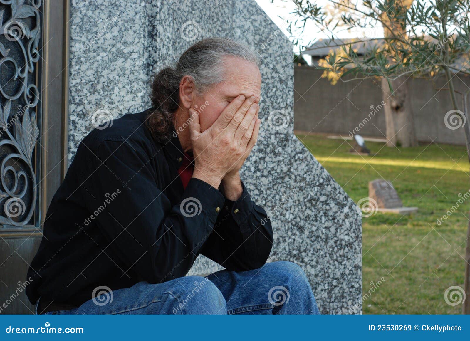 Man sitting at gravesite stock image. Image of aged, hospice - 23530269