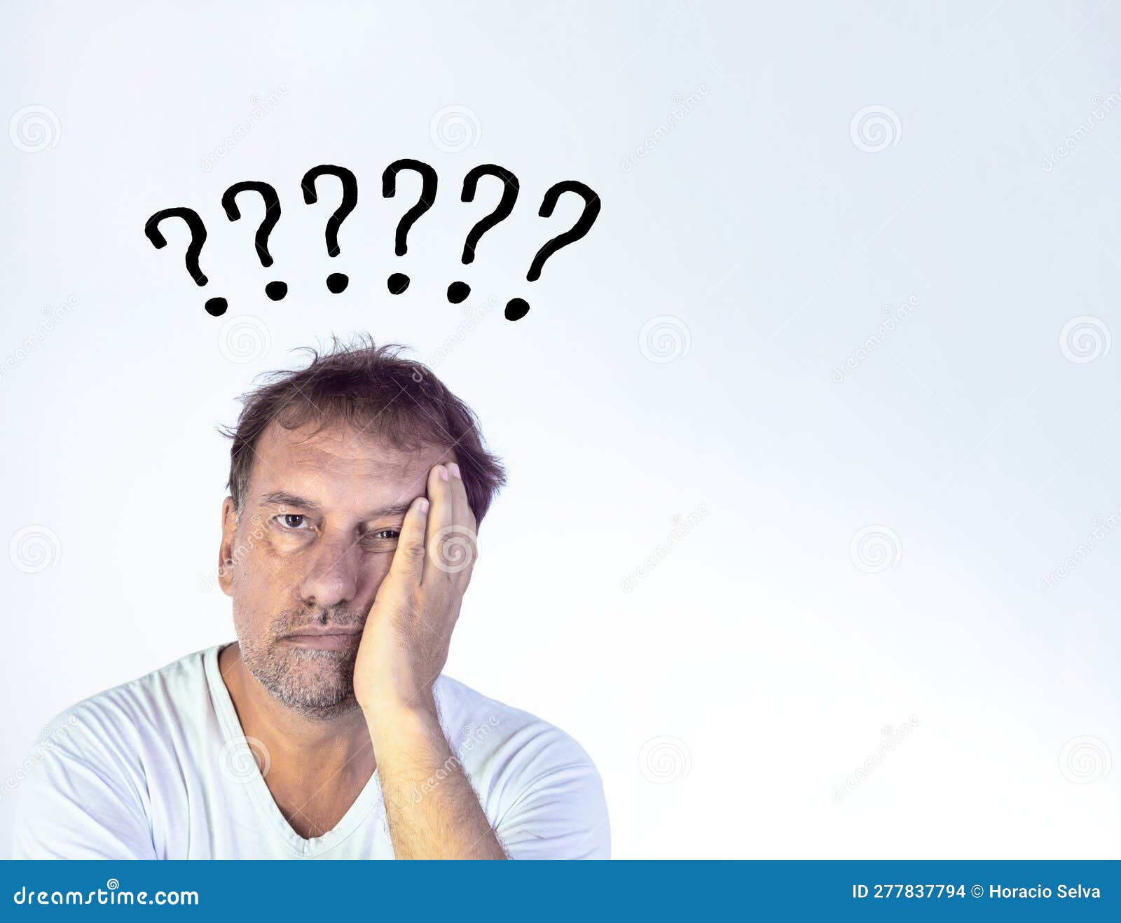 Man Sitting with His Face Resting on His Hand and Question Marks Above ...