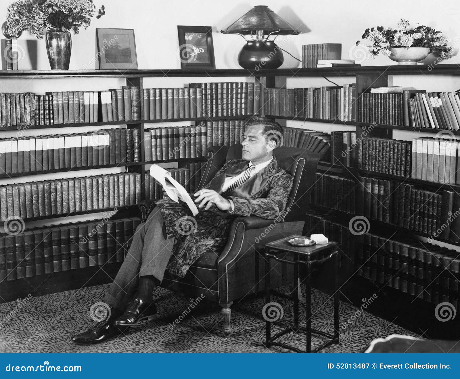 Man Sitting in His Library Reading a Book Stock Image - Image of inside ...