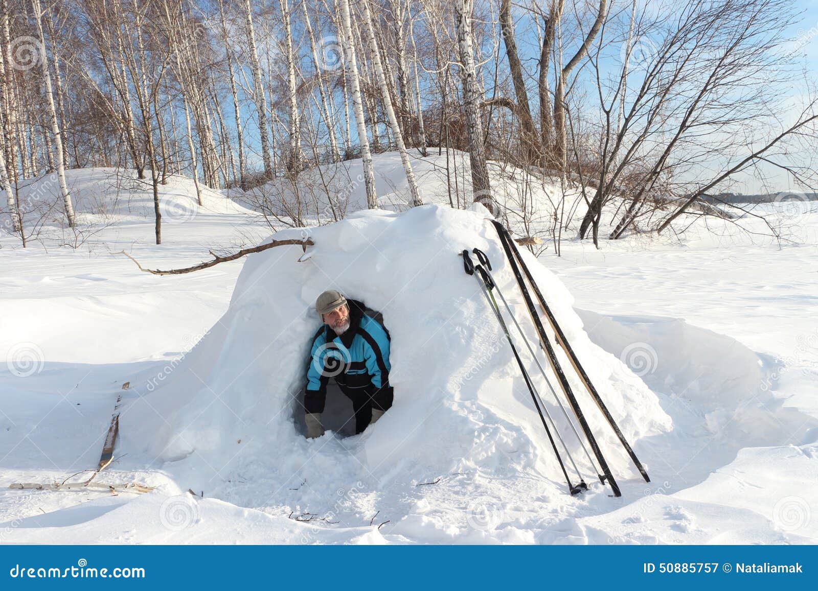 The man sitting in igloo stock image. Image of coast - 50885757
