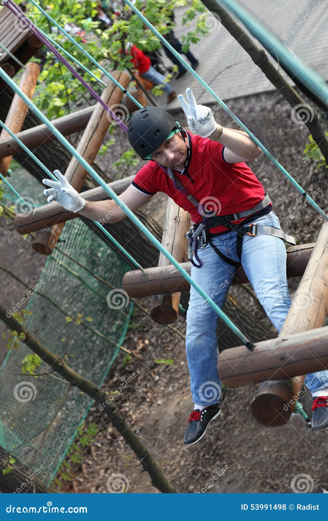 Man sitting on log stock photo. Image of event, park - 53991498