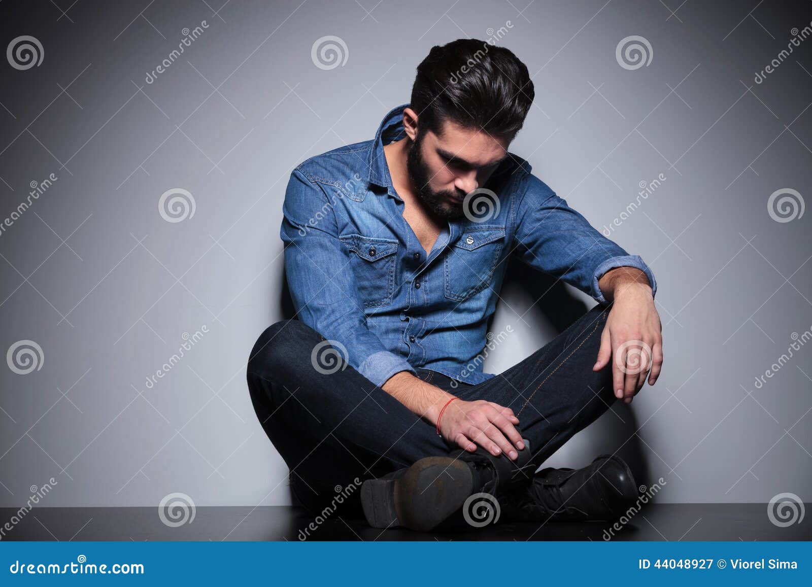 Man Sitting and Looking Down Stock Image - Image of beard, background ...