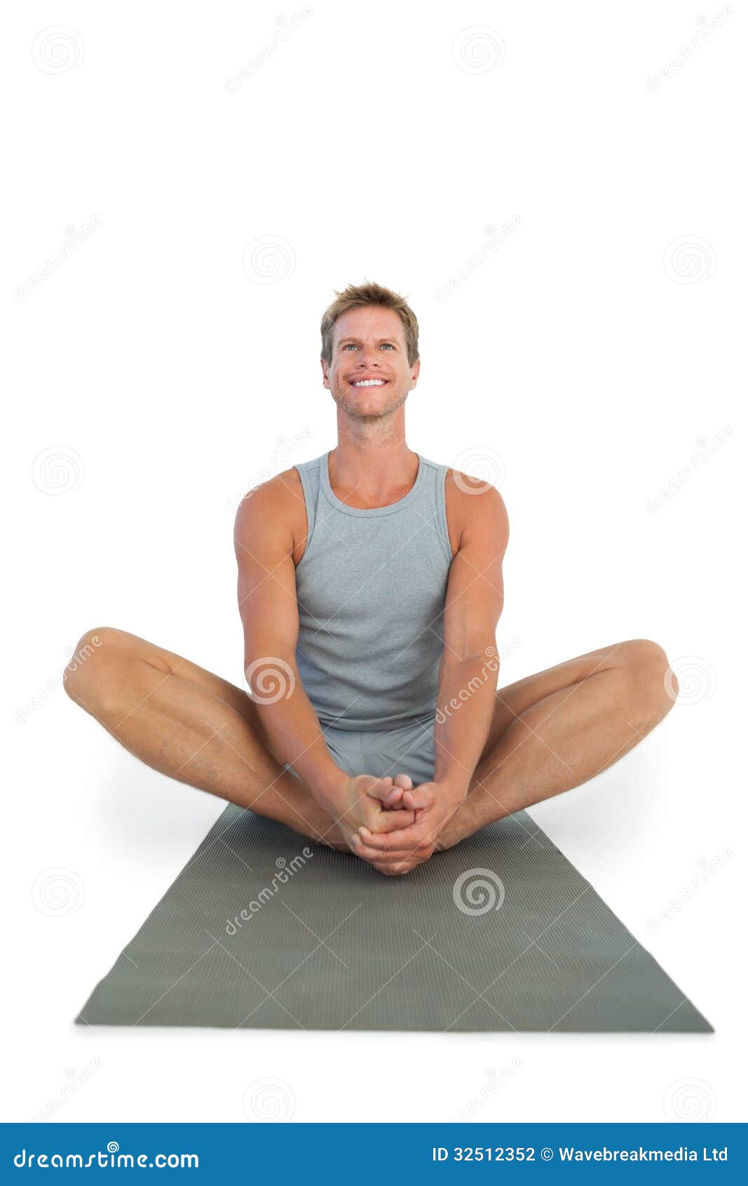 Man Sitting In Lotus Position During A Yoga Session Stock Photo - Image ...