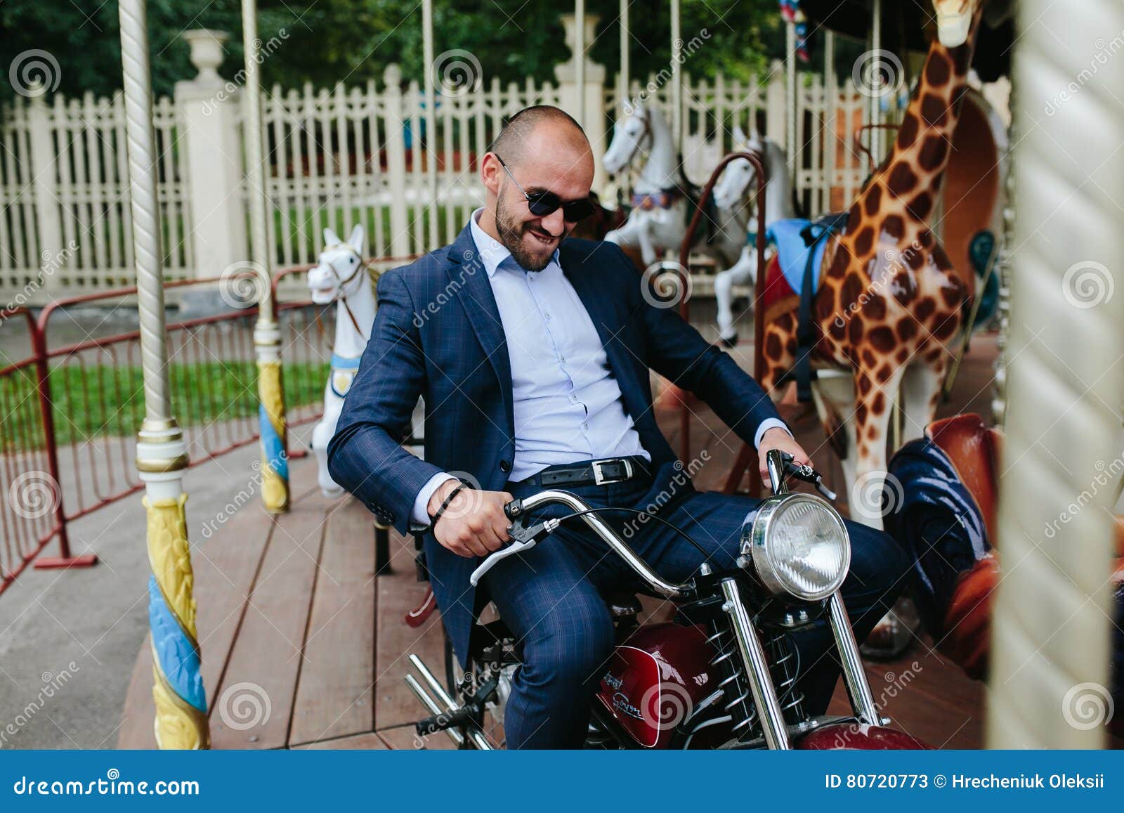 Man Sitting at Motorcycle on the Carousel Stock Image - Image of ...