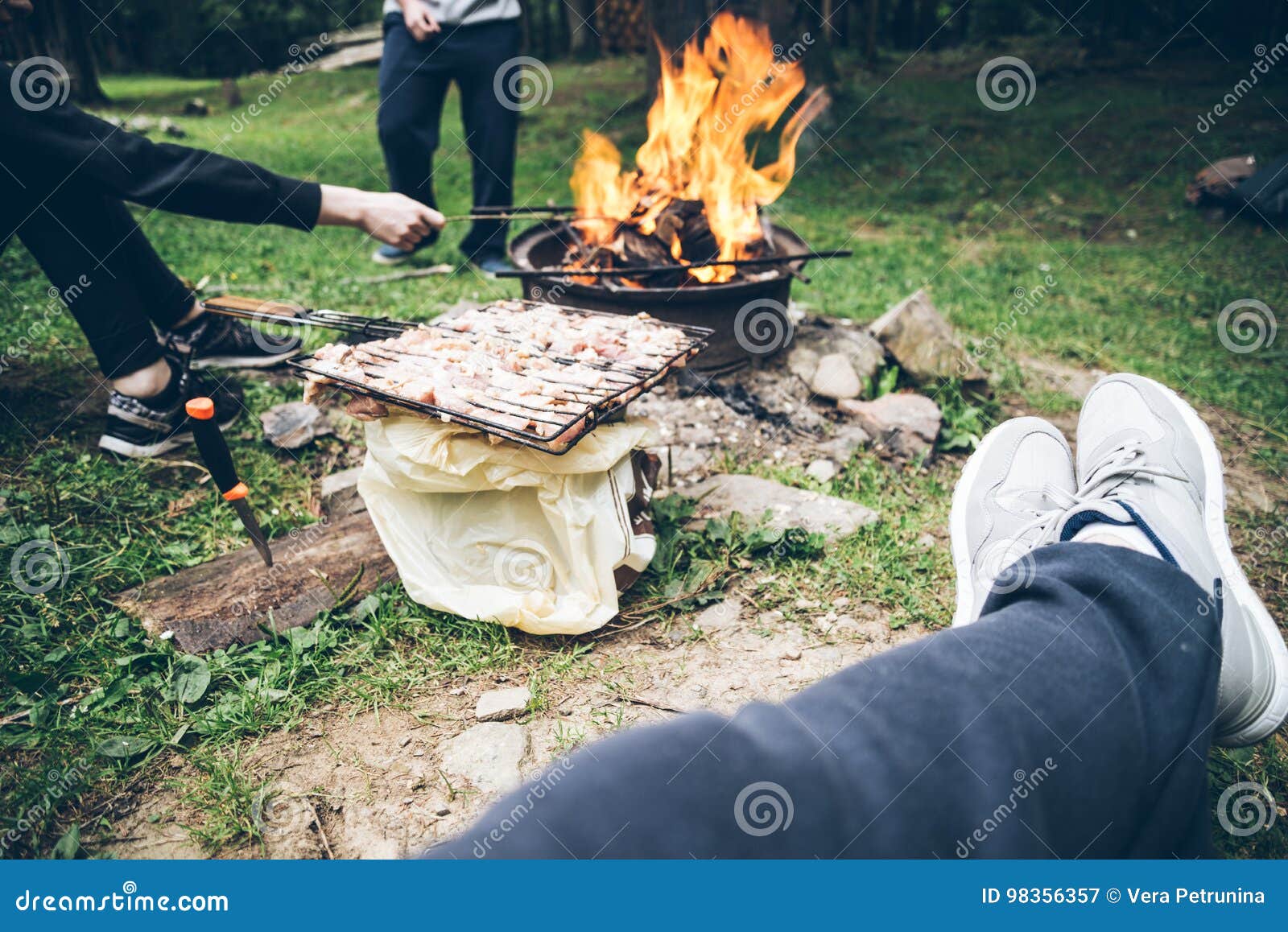 Man Sitting Near Bonfire and Resting Stock Image - Image of outing ...