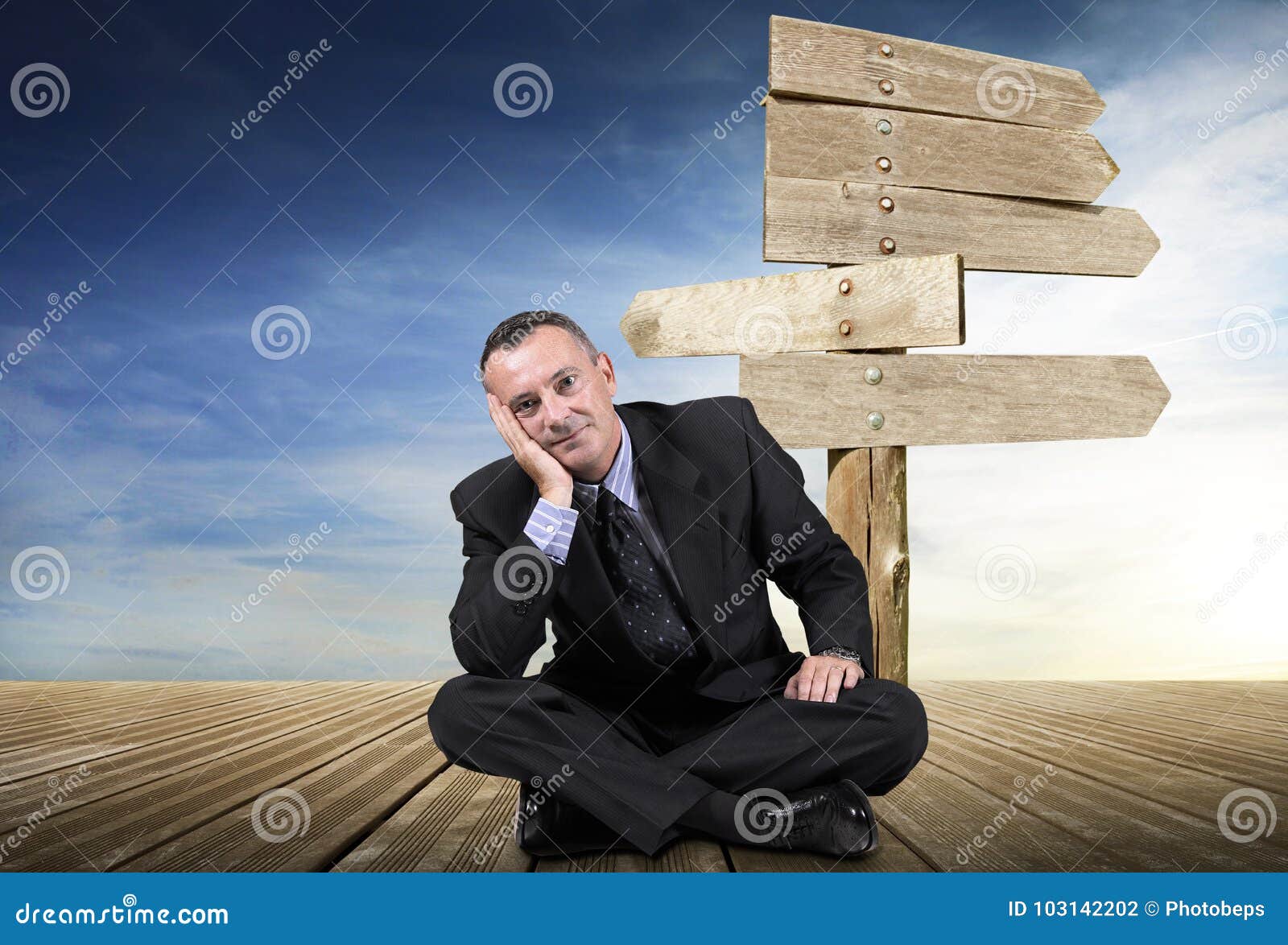 Man Sitting Near Indication Signs Stock Photo - Image of caucasian ...