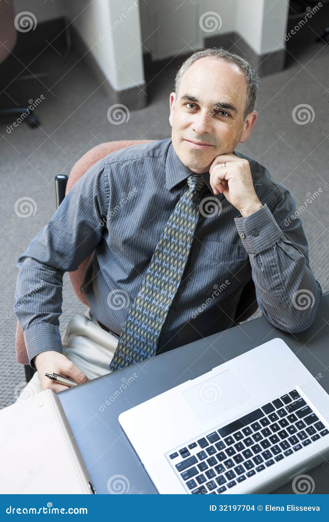 Man sitting at office desk stock photo. Image of laptop - 32197704