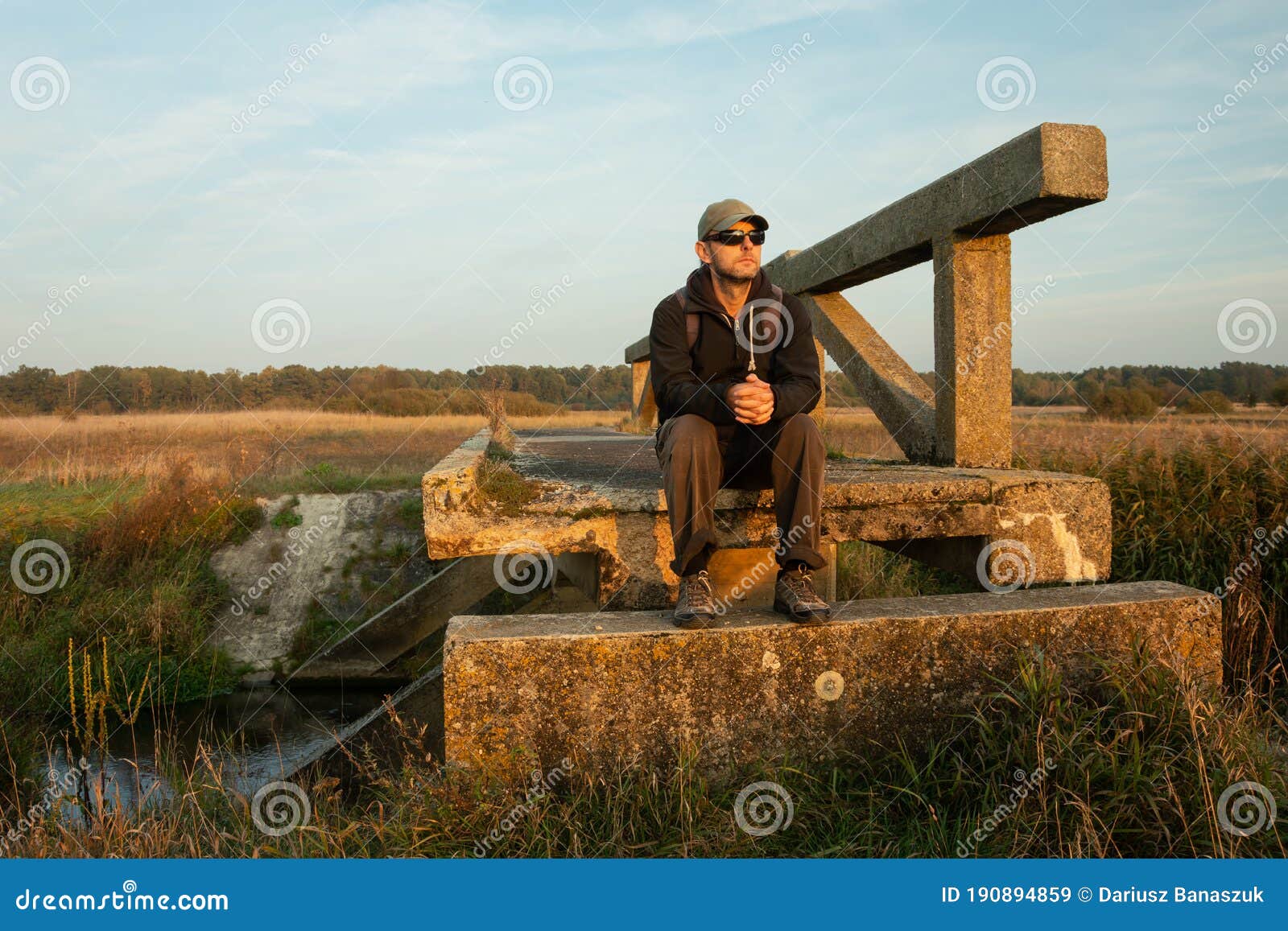 A Man Sitting on an Old Bridge Stock Image - Image of active, bridge ...