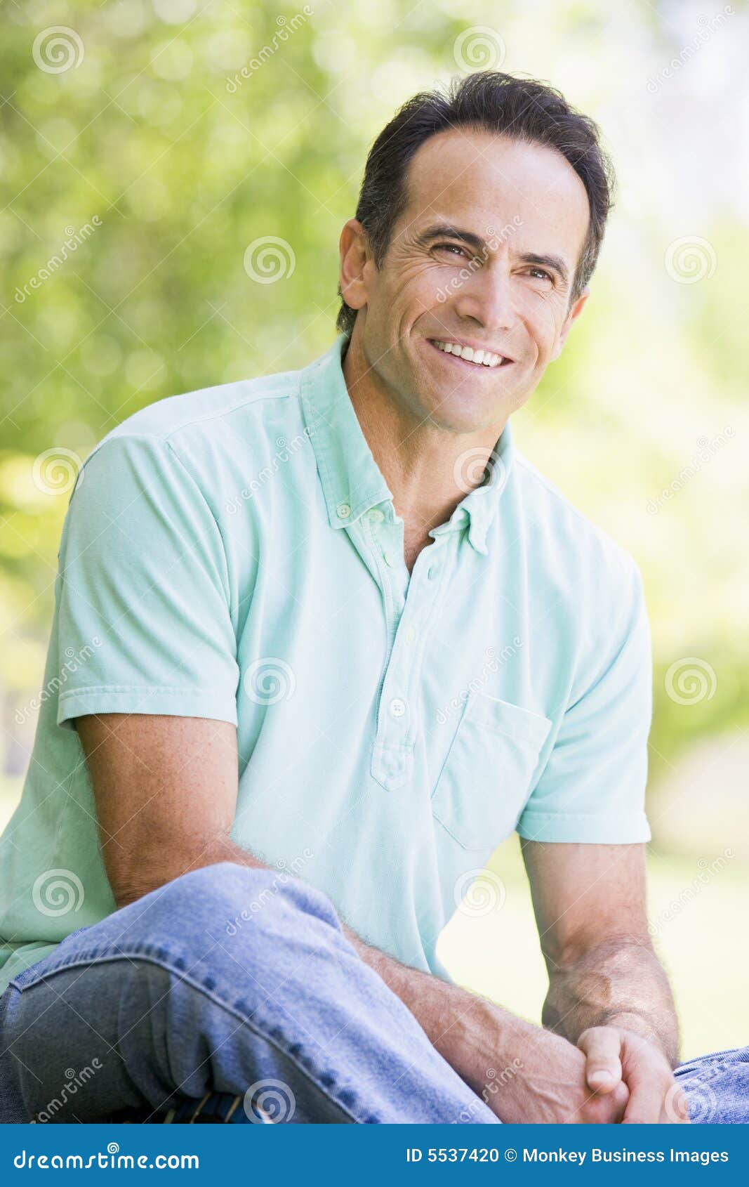 Man Sitting Outdoors Smiling Stock Photo - Image of three, together ...