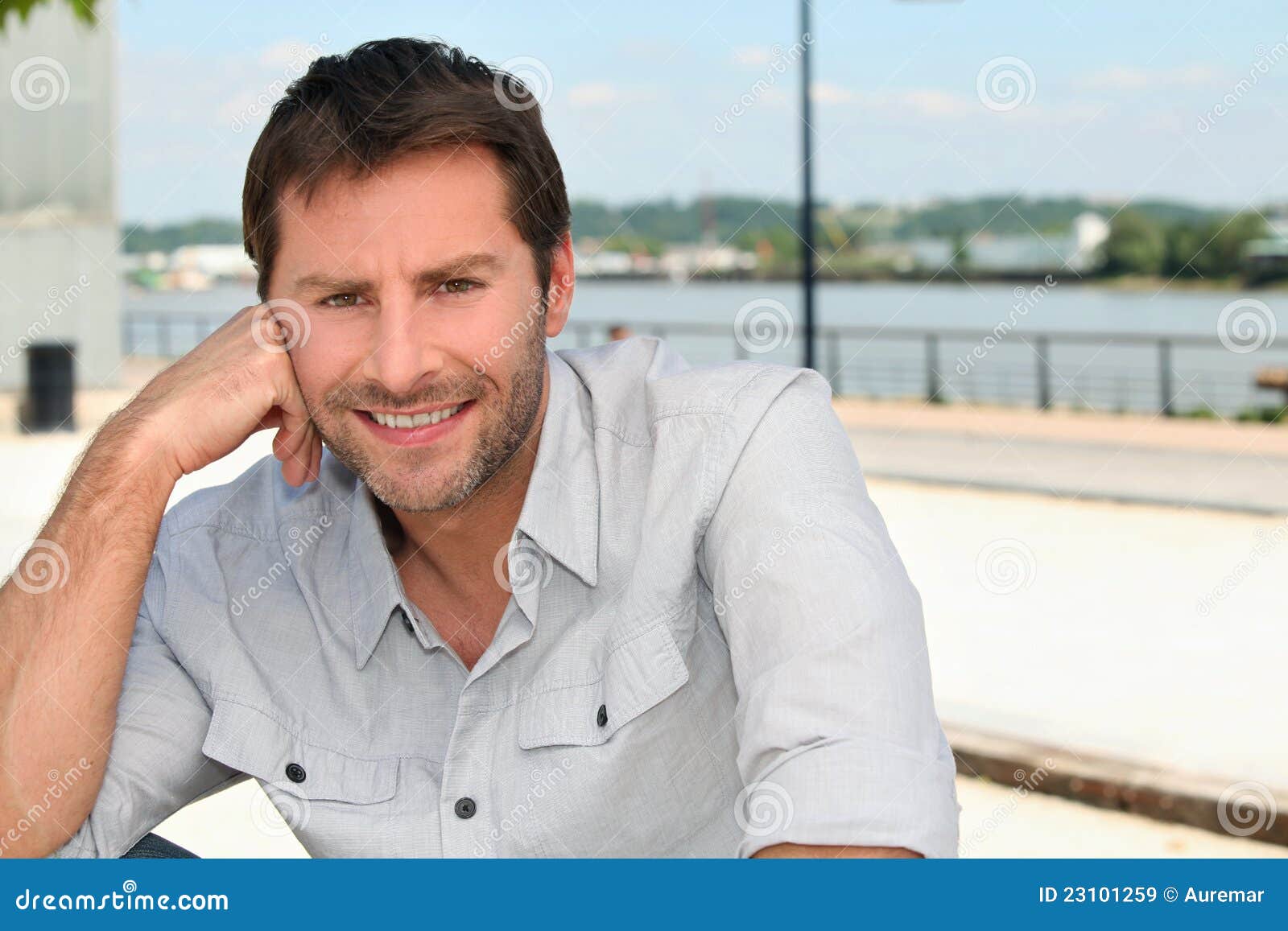 Man sitting outside stock image. Image of landscape, hair - 23101259