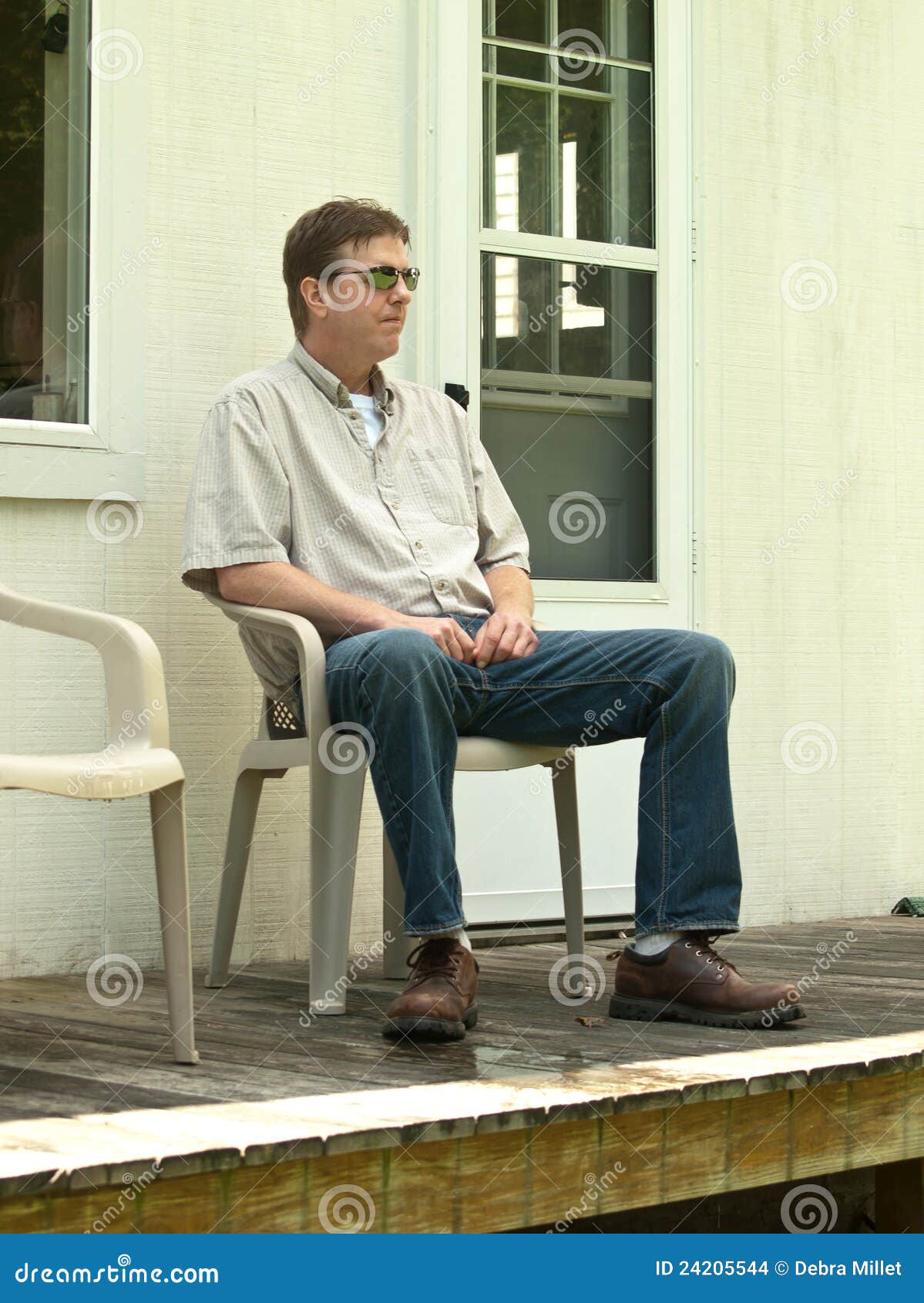 Man sitting on a porch stock photo. Image of house, tall - 24205544