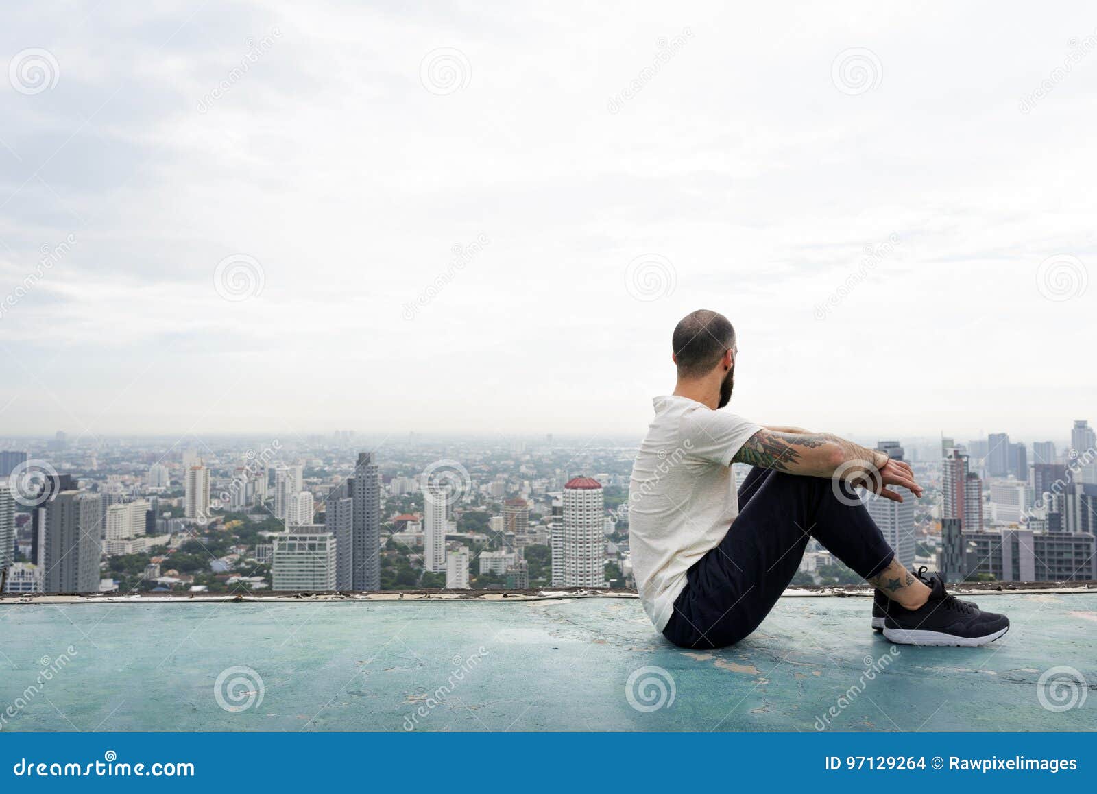 Man Sitting Rest Rooftop Concept Stock Photo - Image of city, clouds ...