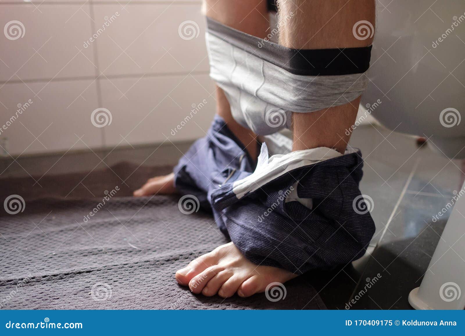 Man Sitting in the Restroom Urinating Having Health Problems Stock ...