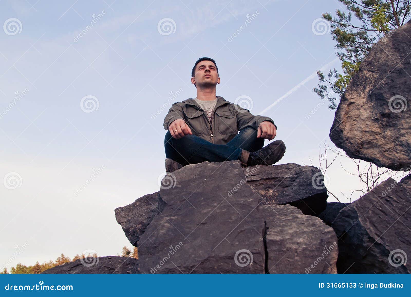 Man sitting on rock stock image. Image of mountains, trekking - 31665153