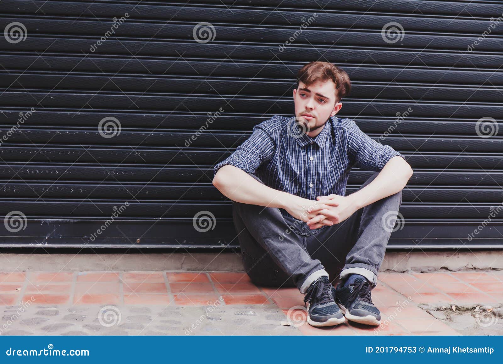 Man sitting sad alone stock image. Image of problem - 201794753