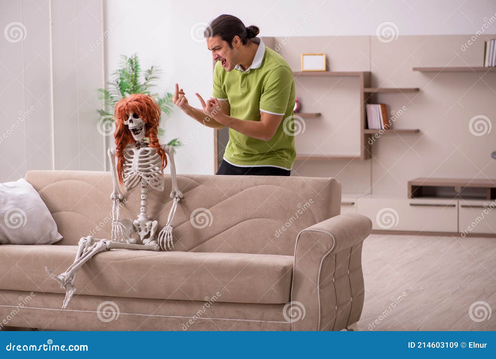 Young Man Sitting on the Sofa with Female Skeleton Stock Image - Image ...
