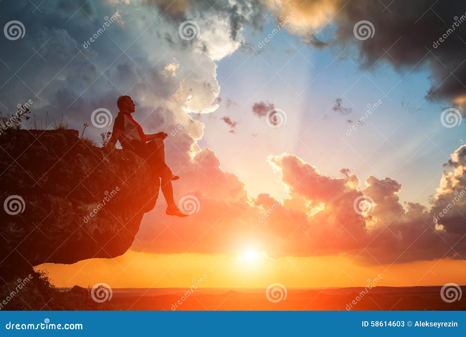 Man Sitting on Stone Top of High Mountain Stock Image - Image of ...