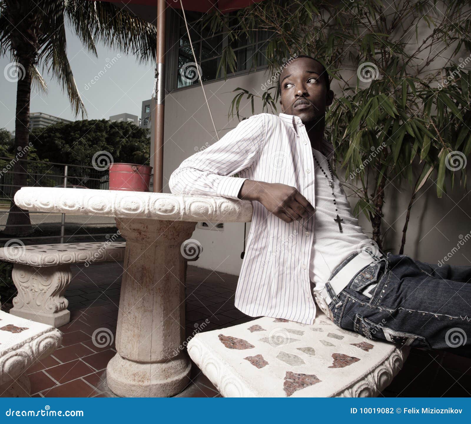 Man sitting on a table stock photo. Image of table, sitting - 10019082