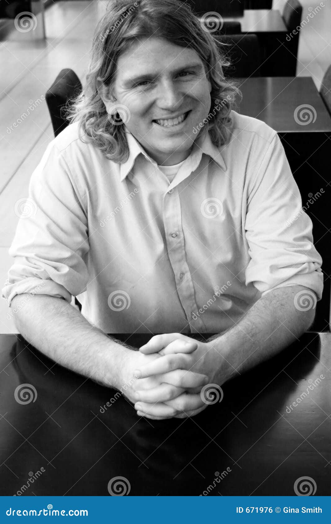 Man sitting at a table stock photo. Image of model, color - 671976