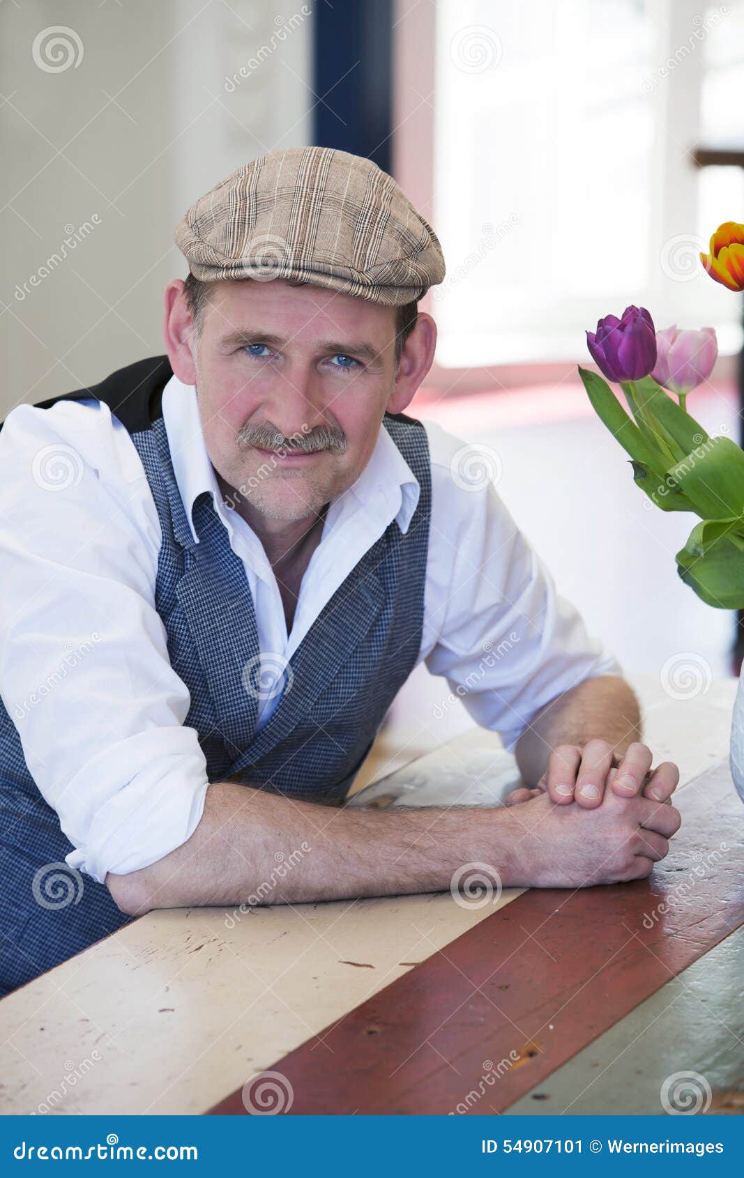 Man sitting at table stock image. Image of casual, room - 54907101