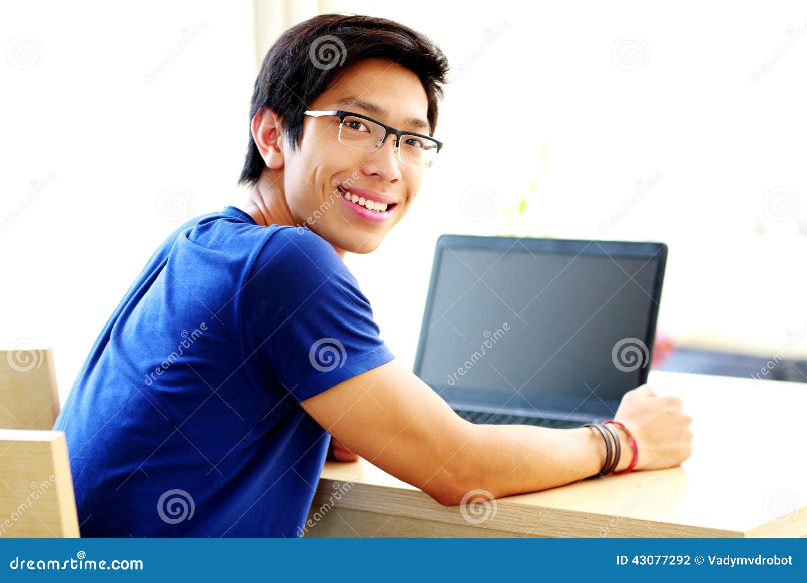 Man Sitting at the Table with Laptop Stock Photo - Image of desk, male ...