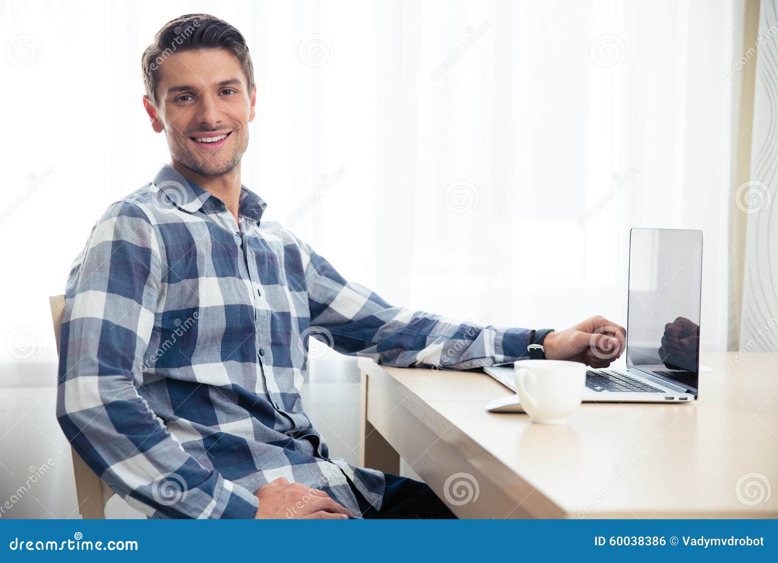 Man Sitting at the Table with Laptop Stock Photo - Image of business ...