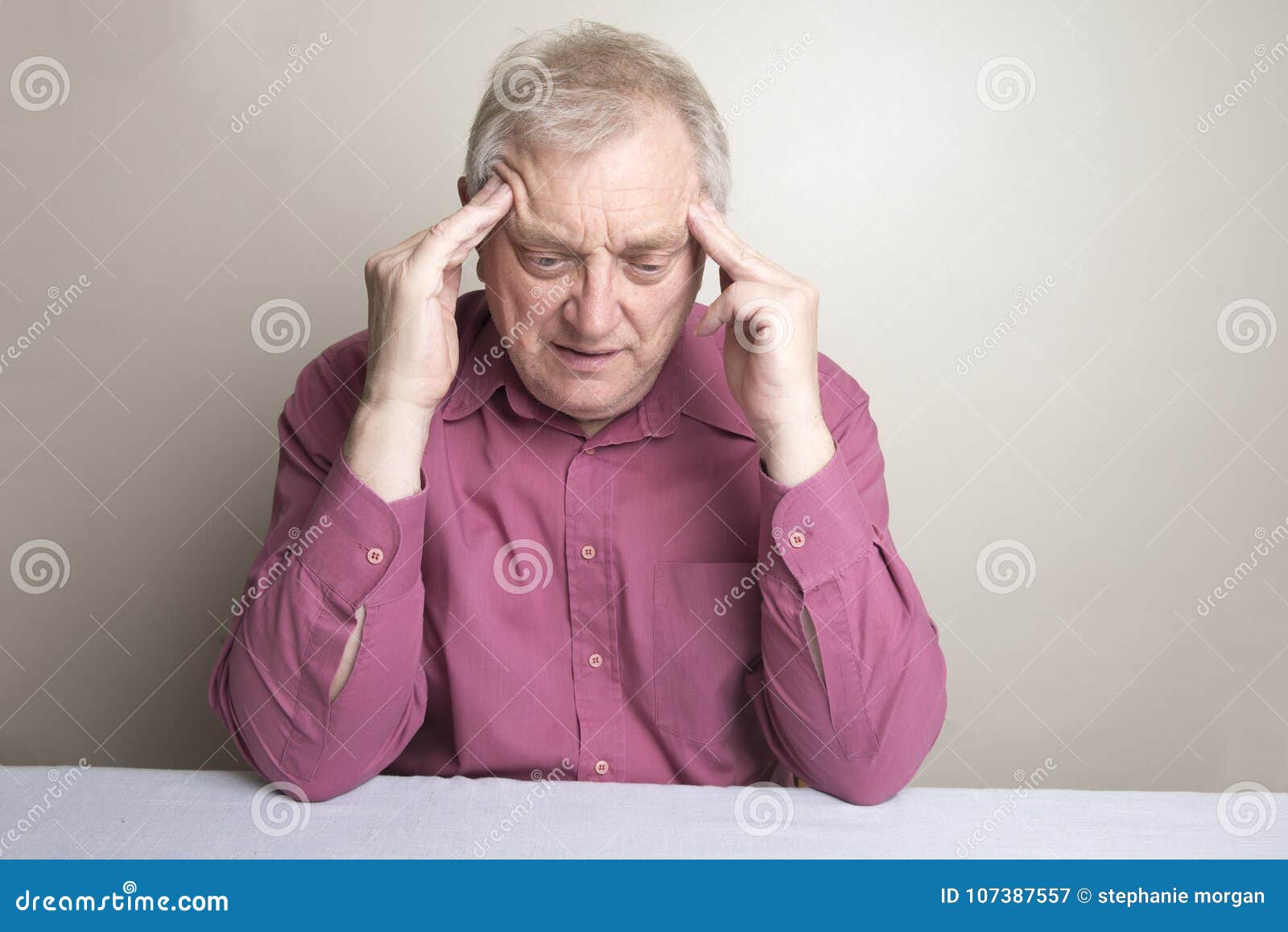 Man Sitting at a Table Looking Confused and Worried Stock Image - Image ...