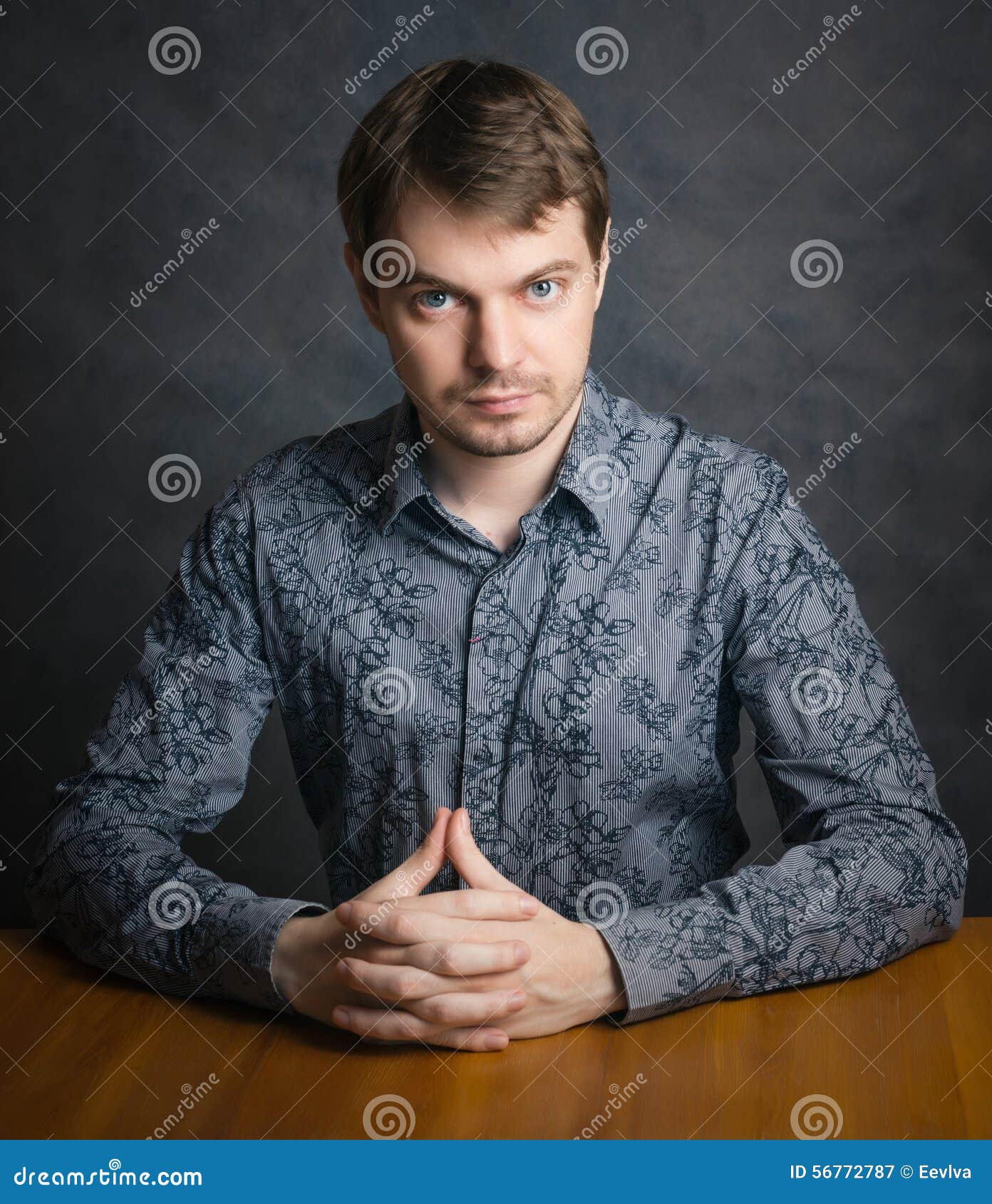 Man sitting at the table. stock image. Image of camera - 56772787