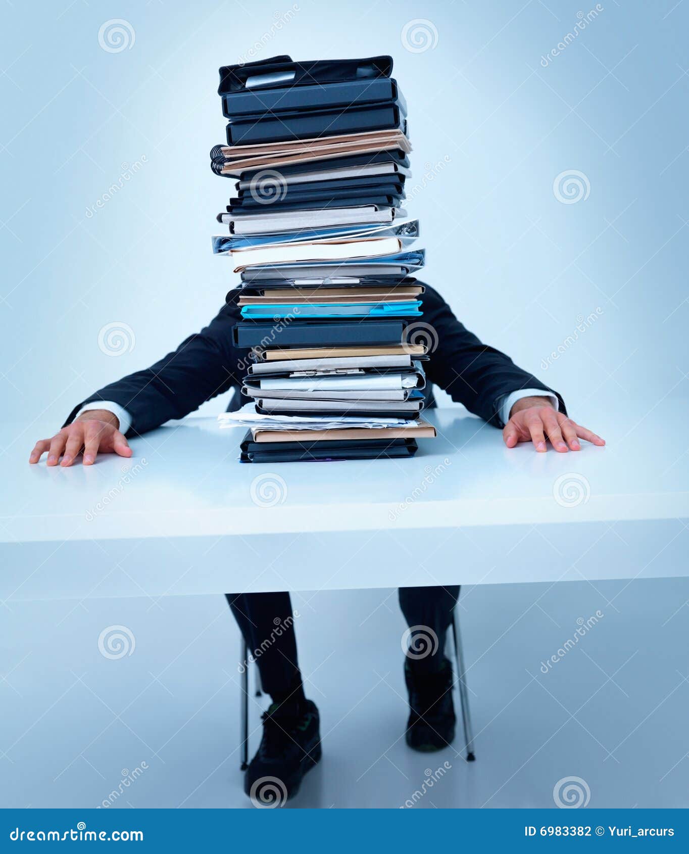 Man Sitting at Table with Stack of Files Stock Photo - Image of company ...