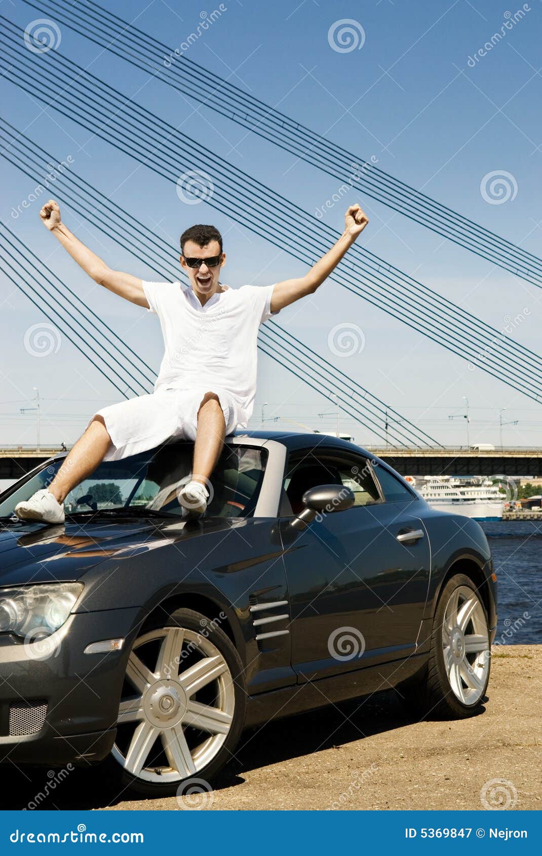 Man Sitting on Top of His Car Stock Image - Image of looking, modern ...