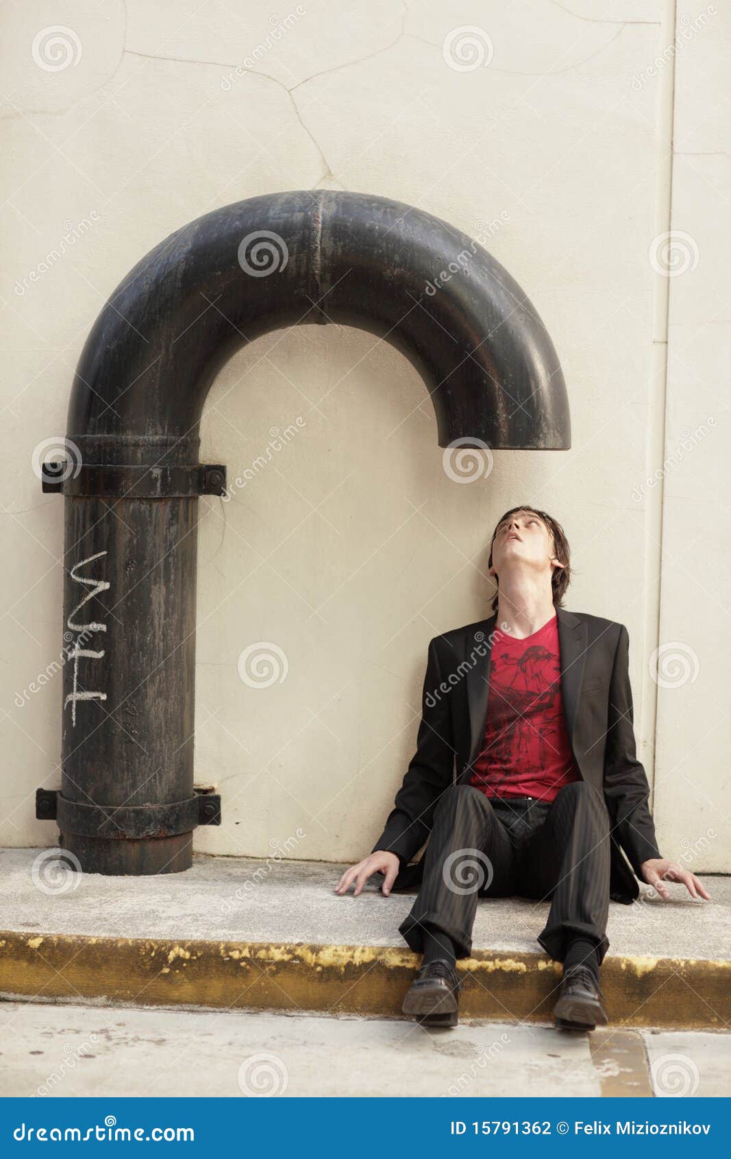 Man Sitting Under an Industrial Pipe Stock Photo - Image of shape, male ...