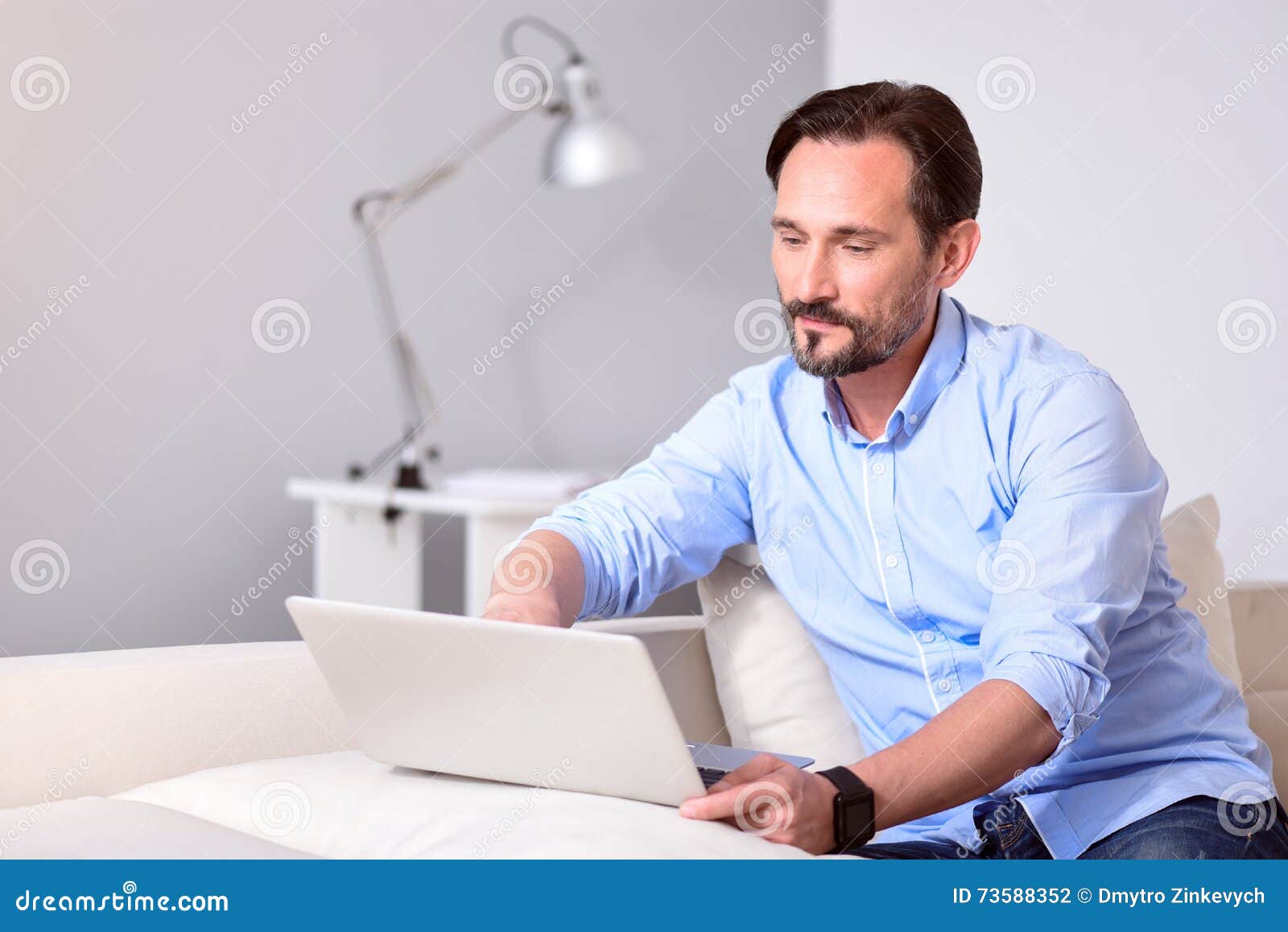 Man Sitting and Using Laptop Stock Photo - Image of capacity ...