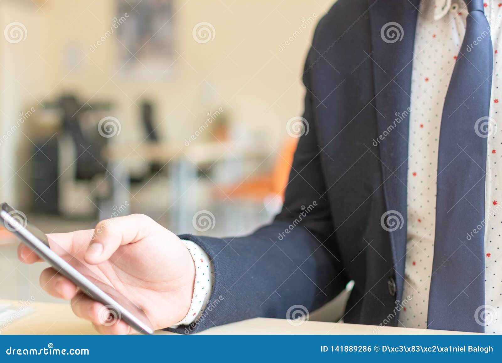 Man Sitting while Using the Mobile Smartphone. Confident Entrepreneur ...