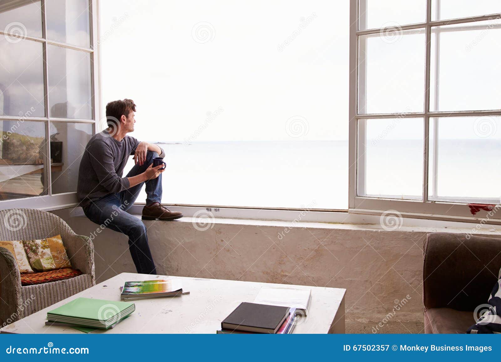 Man Sitting at Window and Looking at Beautiful Beach View Stock Image ...