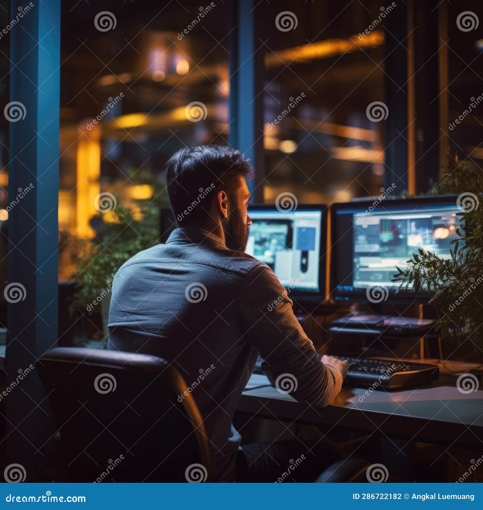 Man Sitting Working On System Development Programmer In Office Stock