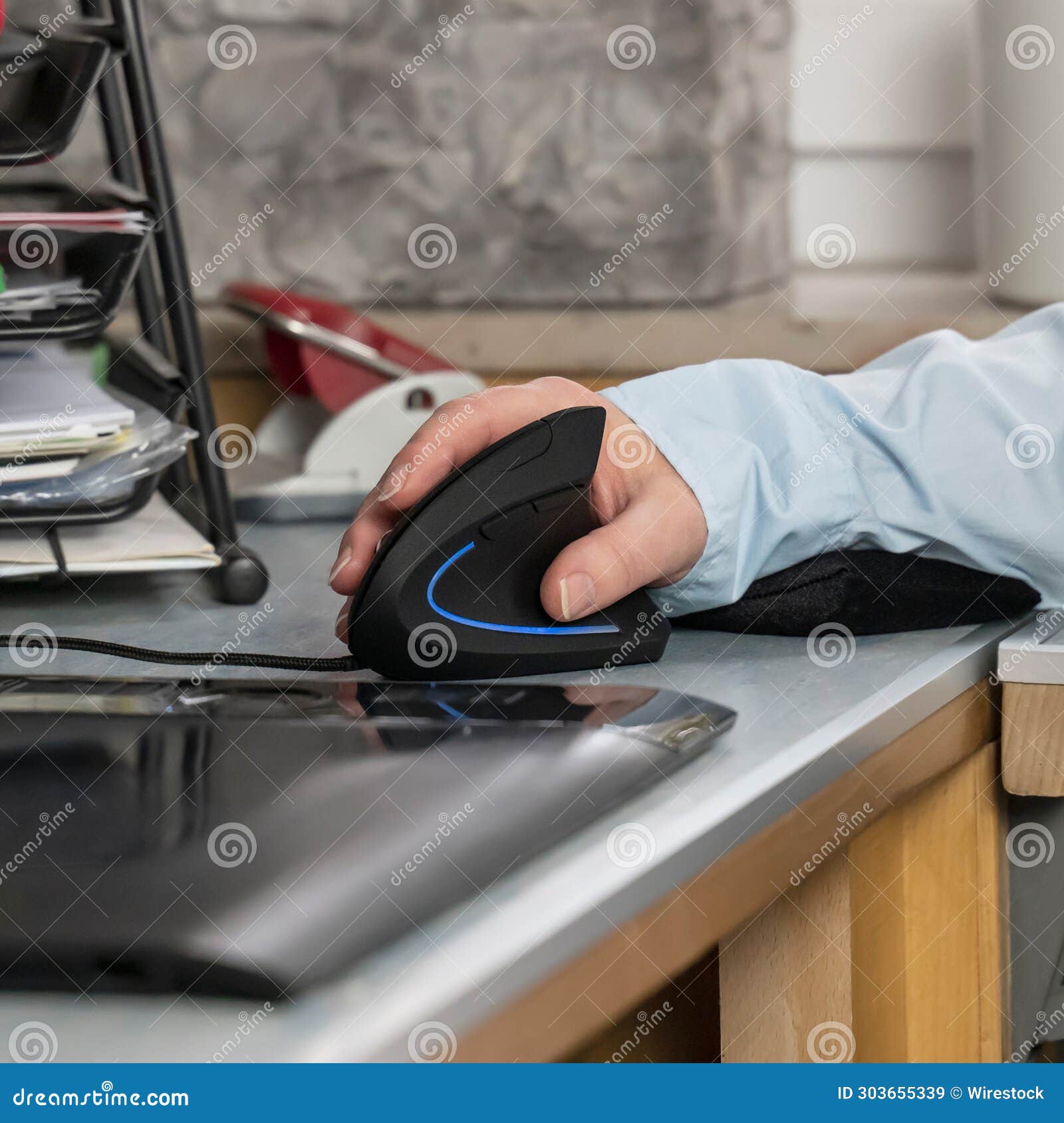 Man Sitting at a Workspace Desk, Holding a Computer Mouse Stock Image ...