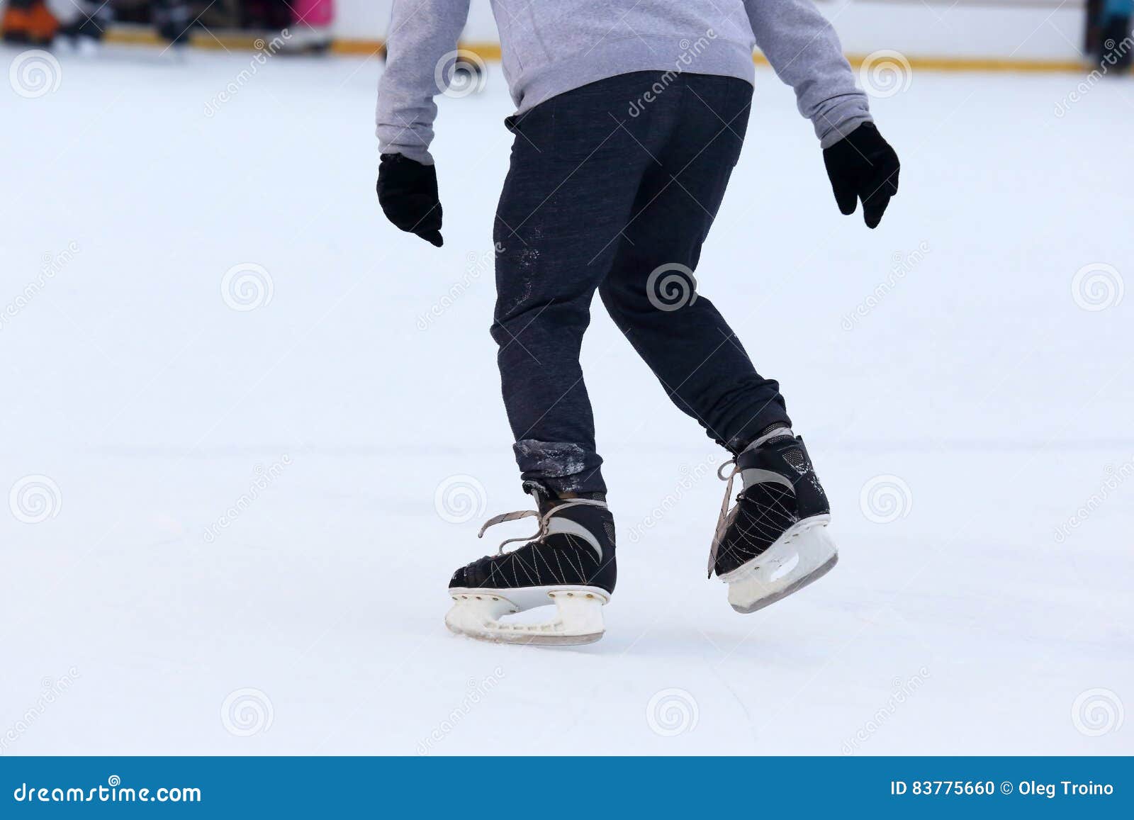 Man skating on an ice rink stock photo. Image of recreation - 83775660