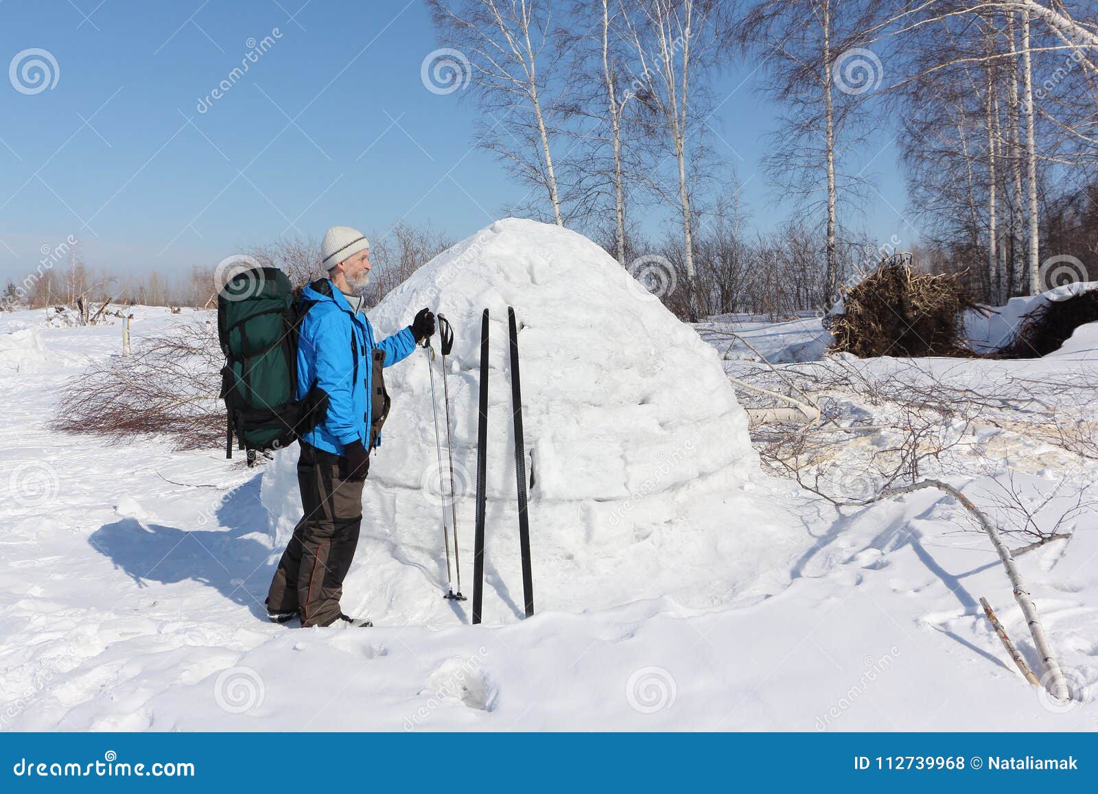 Man Skier Standing by an Igloo on a Glade Stock Photo - Image of ...