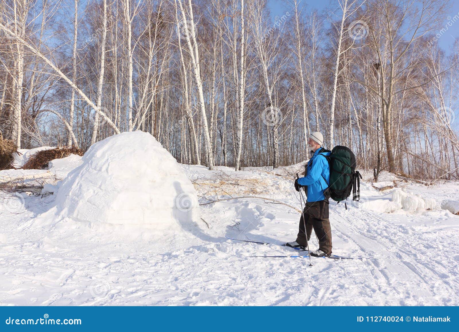 Man Skier Standing by an Igloo on a Glade Stock Photo - Image of coast ...
