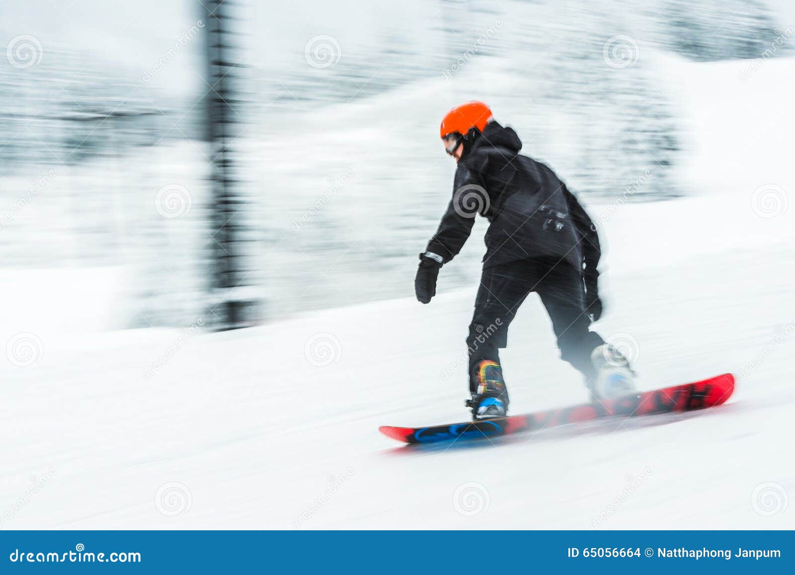 A Man Skiing Snow Board Very Fast. Blurred Picture Stock Photo - Image ...