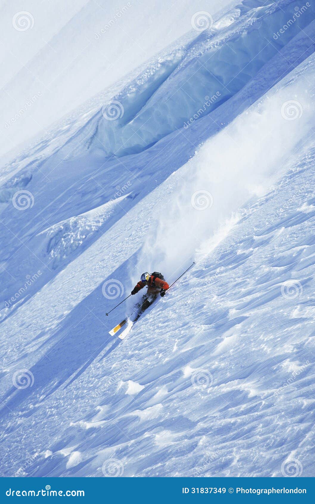 Man Skiing on Steep Slope stock image. Image of active - 31837349