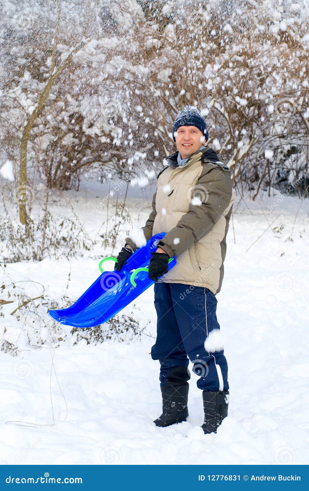 Man with sledge stock image. Image of braking, winter - 12776831