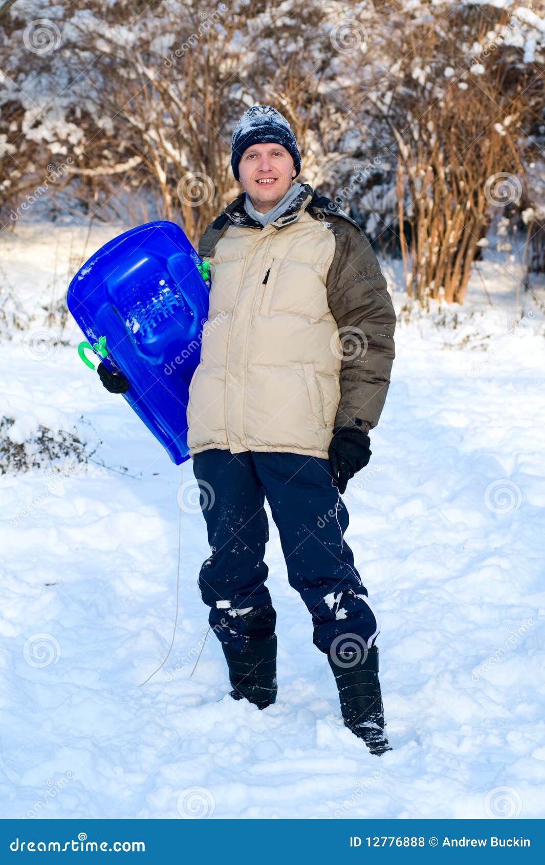 Man with sledge stock photo. Image of happy, ride, coat - 12776888